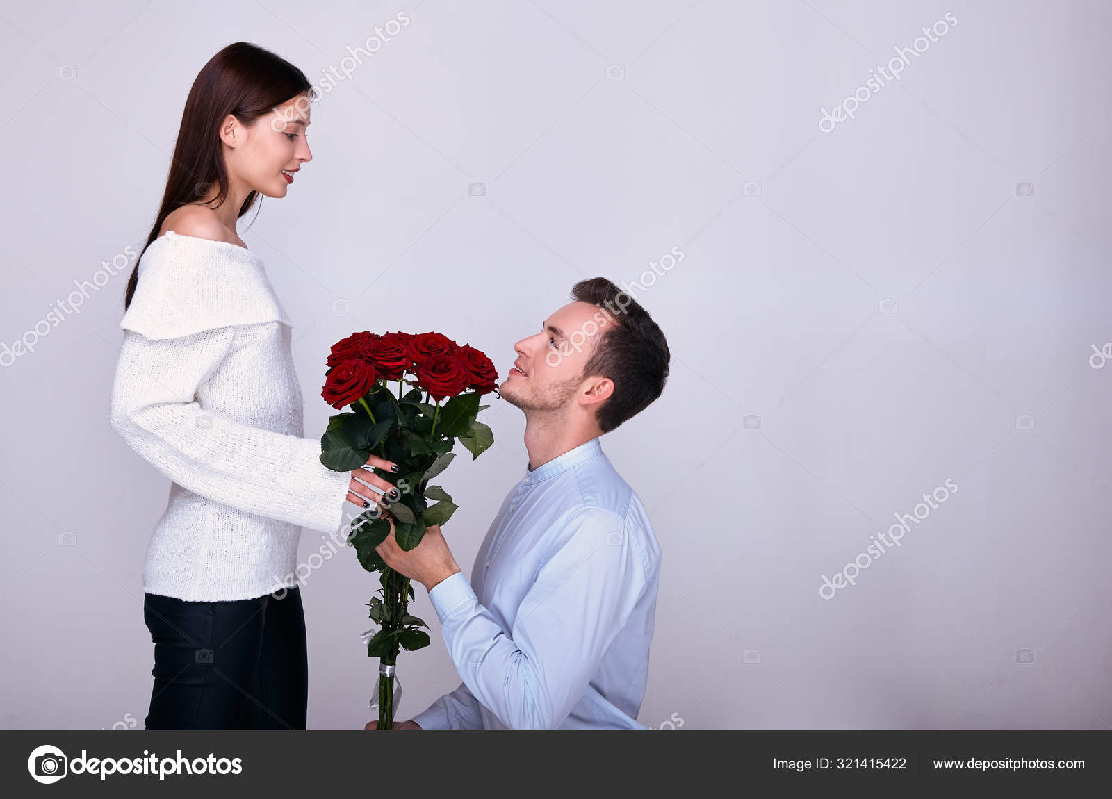 A Man Giving Roses To A Girl