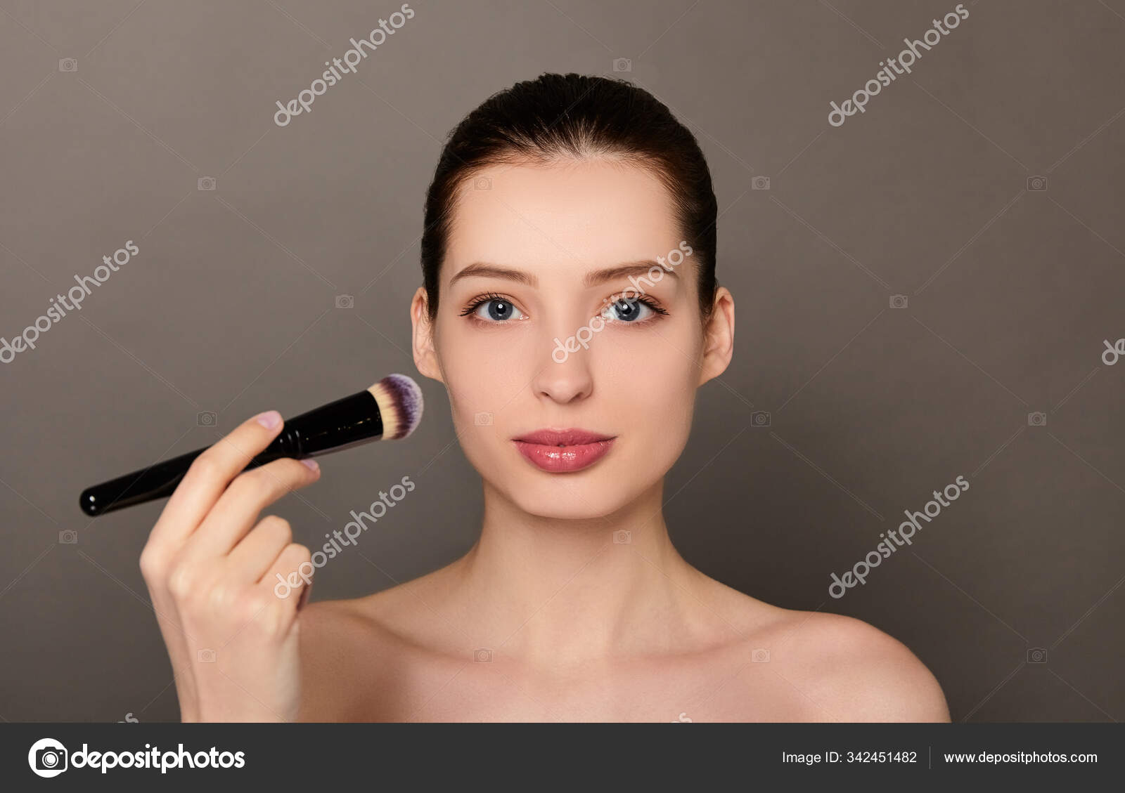 Portrait of beautiful woman powder face with brush Stock Photo by ...