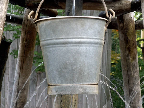 Bucket with holes Stock Photos, Royalty Free Bucket with holes Images ...