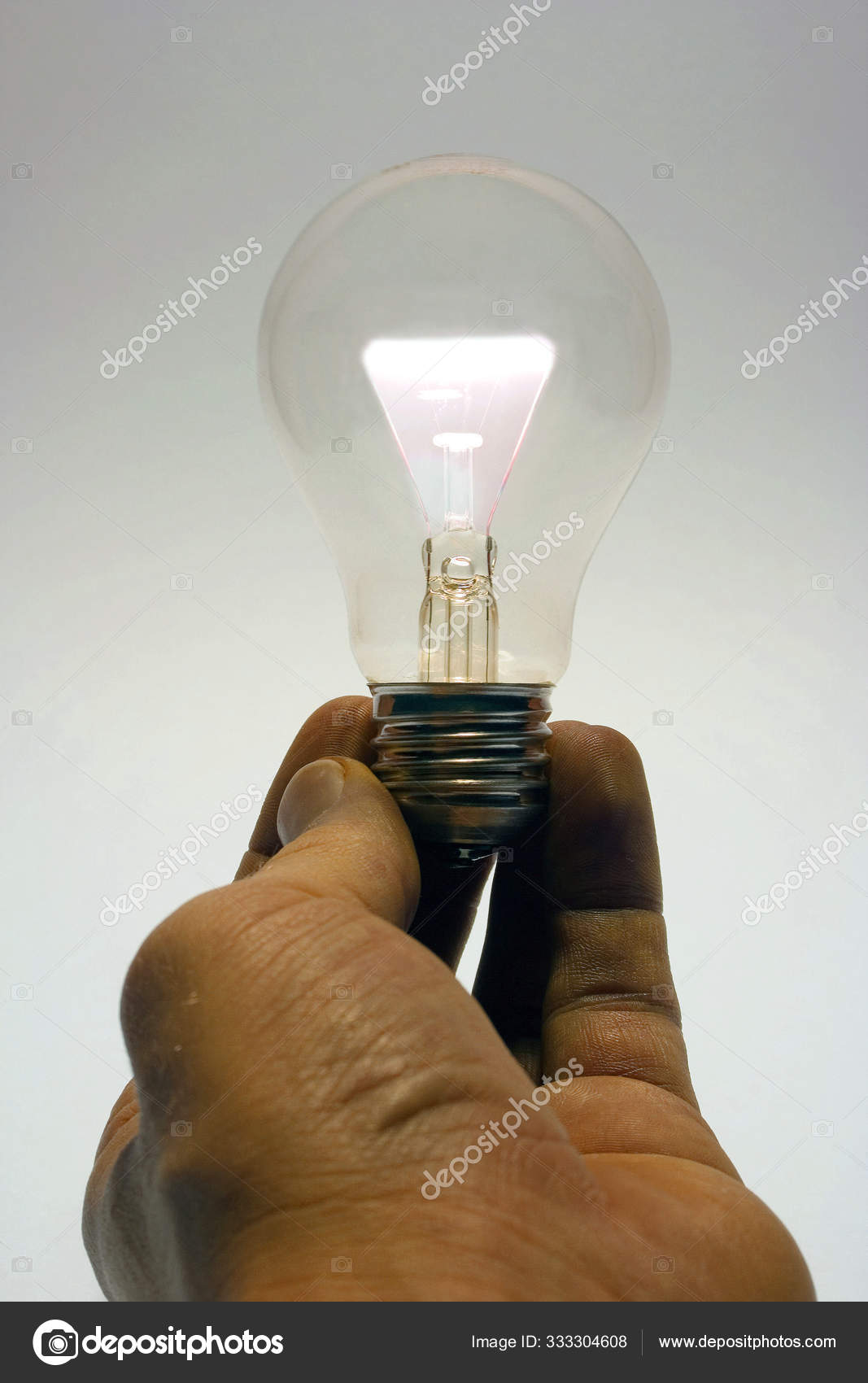 Hand Holding Light Bulb — Stock Photo © PantherMediaSeller #333304608
