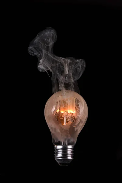 Light Bulb Black Background — Stock Photo © PantherMediaSeller #352918560