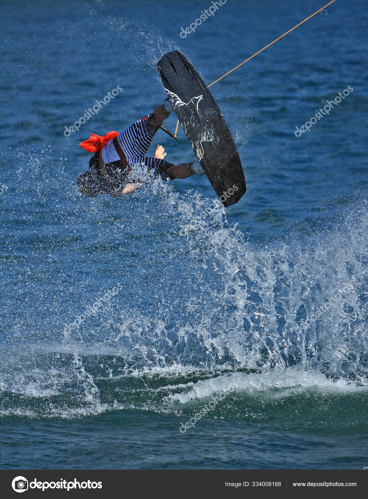 Man Blue Jacket Jumping Sea — Stock Photo © PantherMediaSeller #334008166