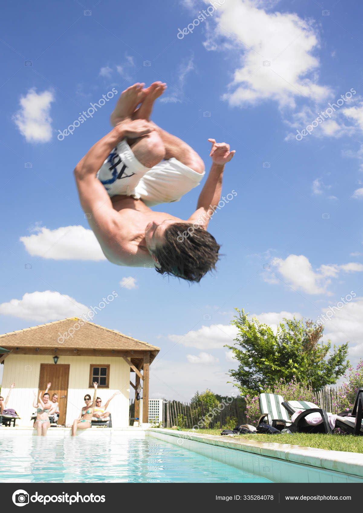Man Diving Into A Pool