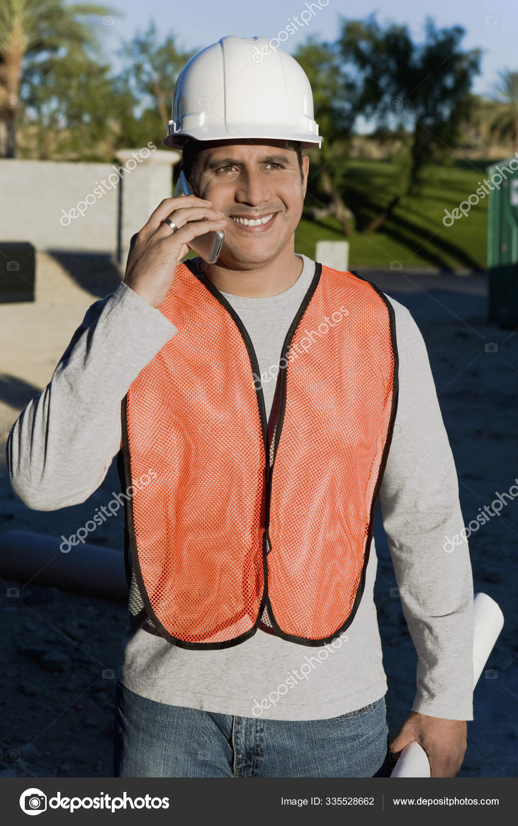 Construction Worker Using Cell Phone Stock Photo by ©PantherMediaSeller ...