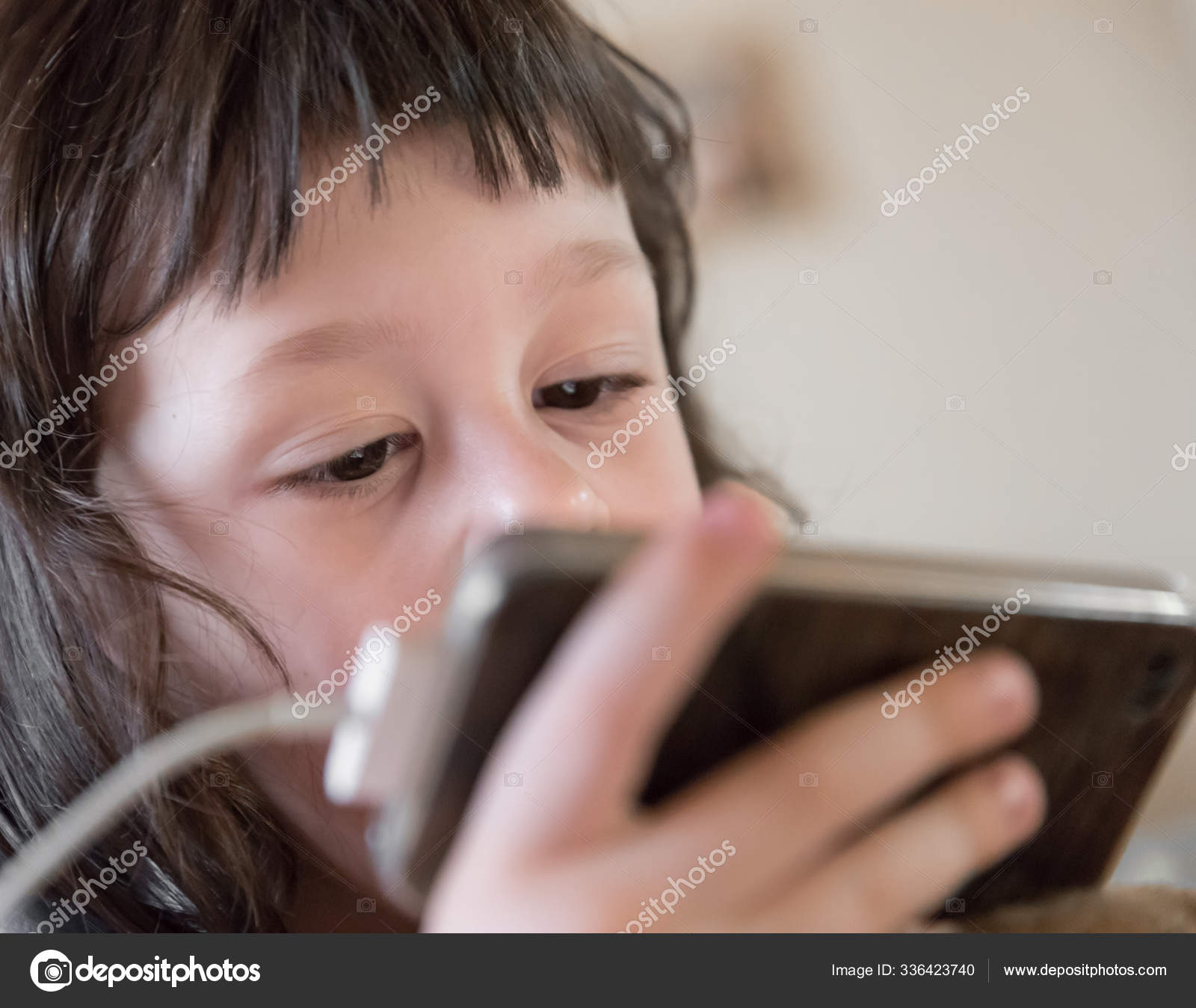 Cute Young Child Watching Screen Smartphone Closely Digital Device ...