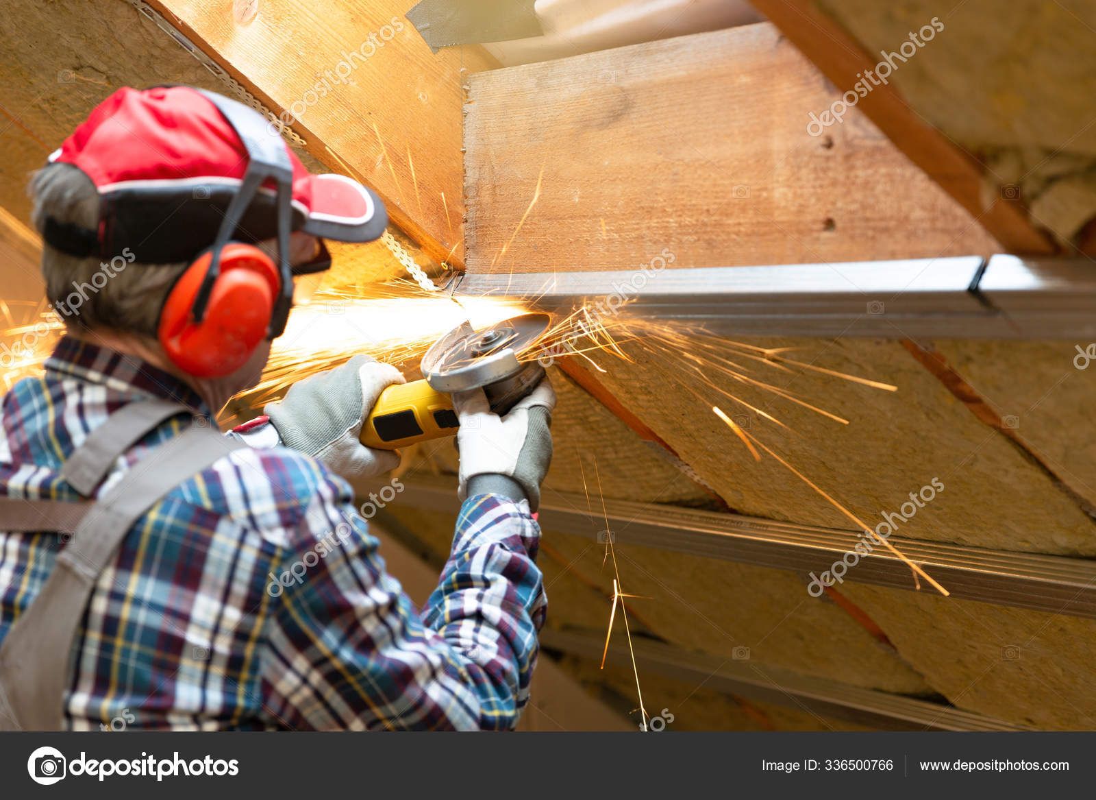Man Fixing Metal Frame Using Angle Grinder Attic Ceiling Covered ...