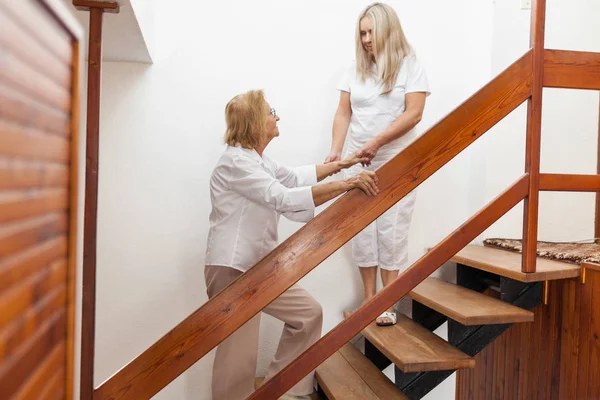 Helping elderly vertical Stock Photos, Royalty Free Helping elderly ...