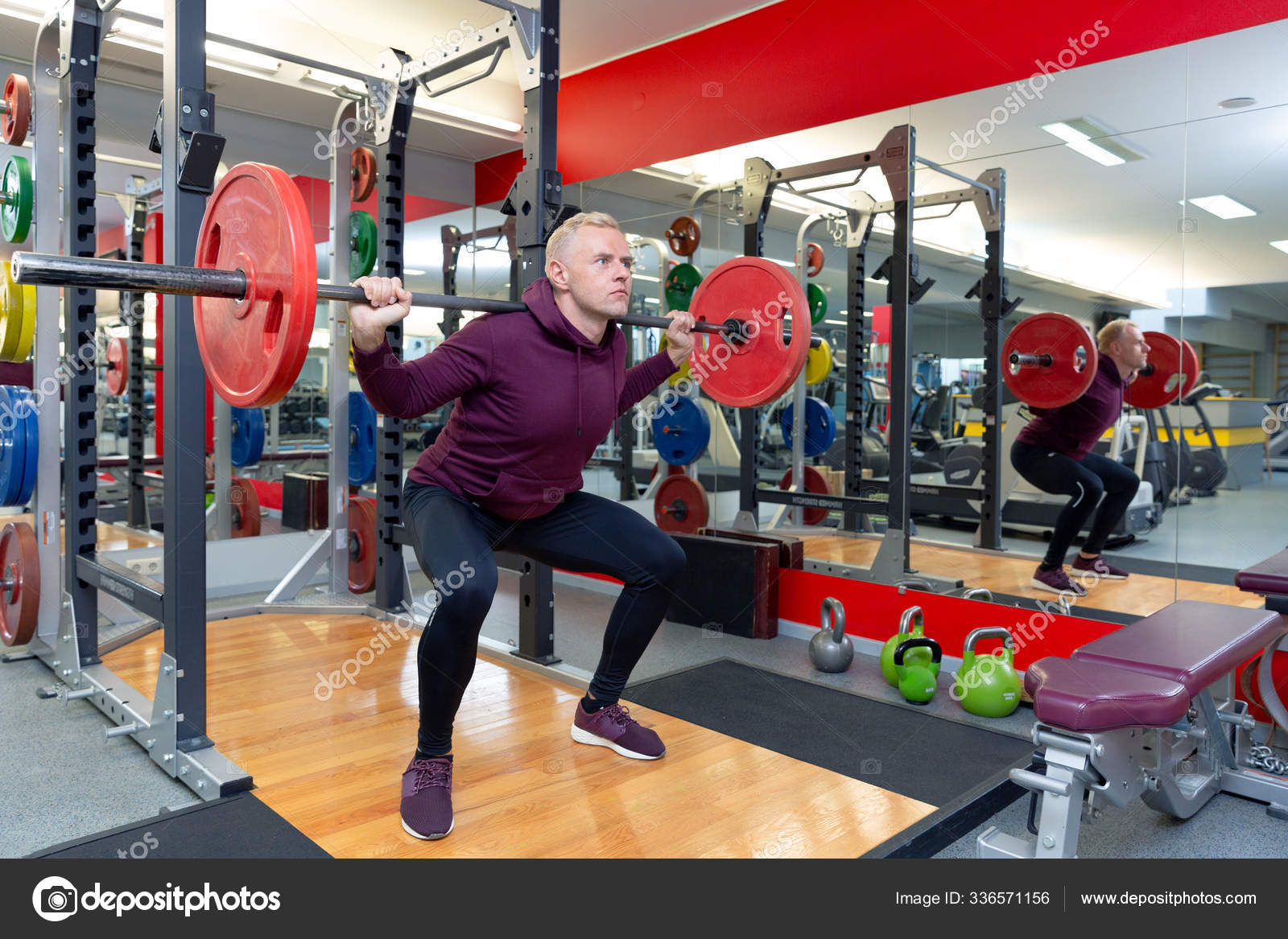 Young Man Lifting Heavy Weights Workout Session Man Training Barbell ...