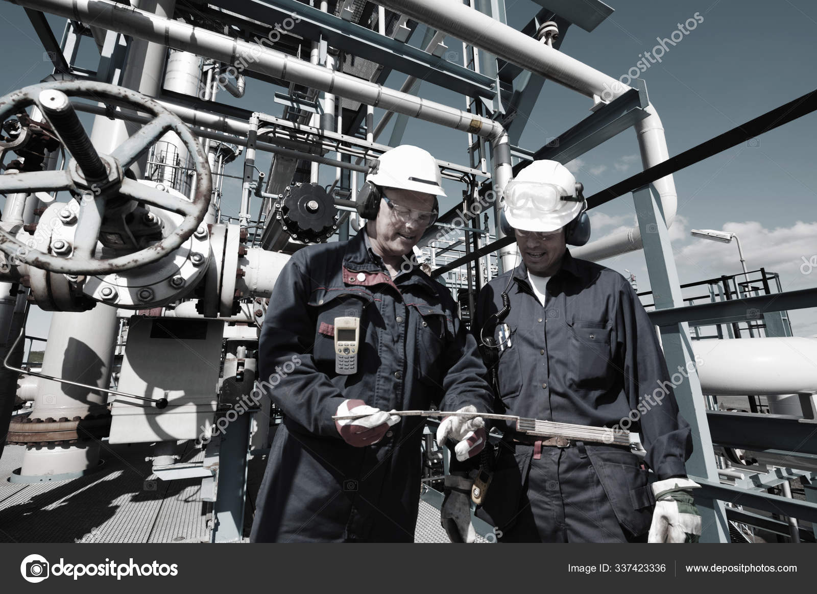 Two Oil Gas Workers Large Oil Gas Refinery Petrochemical Industry ...