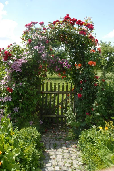 Flower garden gate Stock Photos, Royalty Free Flower garden gate Images ...