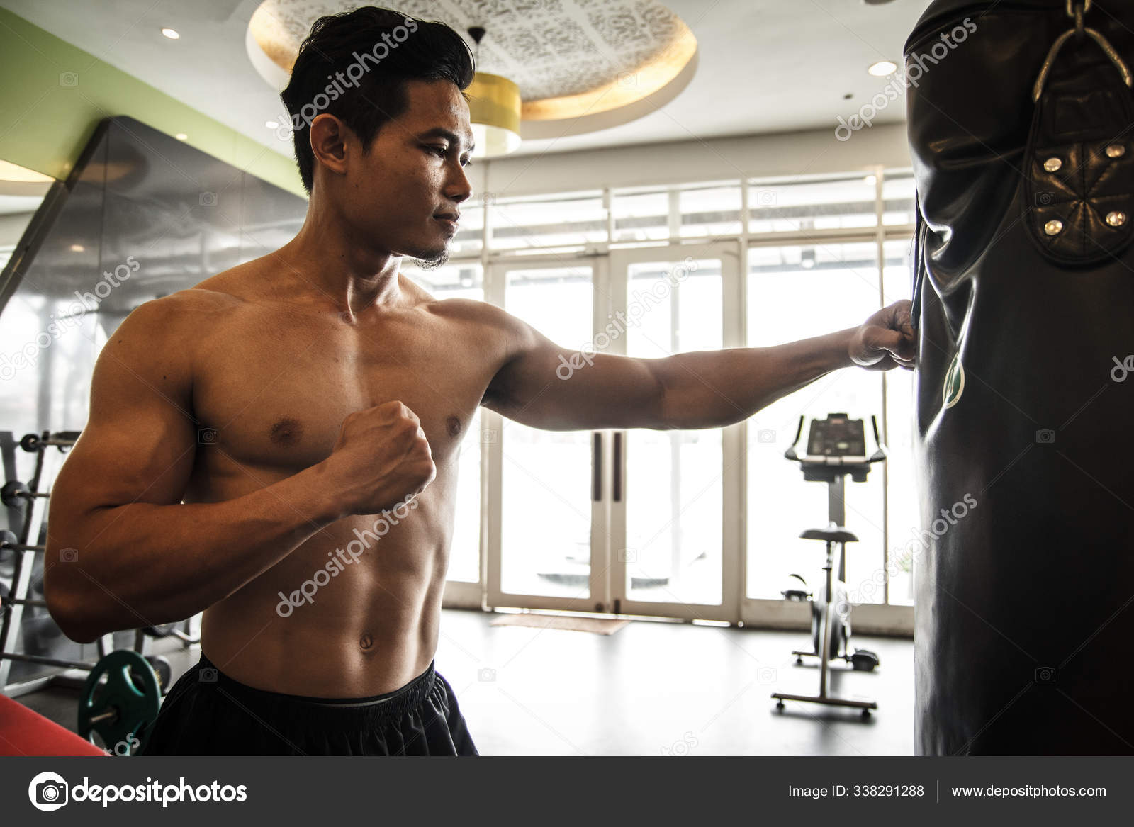 Man Performs Exercise Boxing — Stock Photo © PantherMediaSeller #338291288
