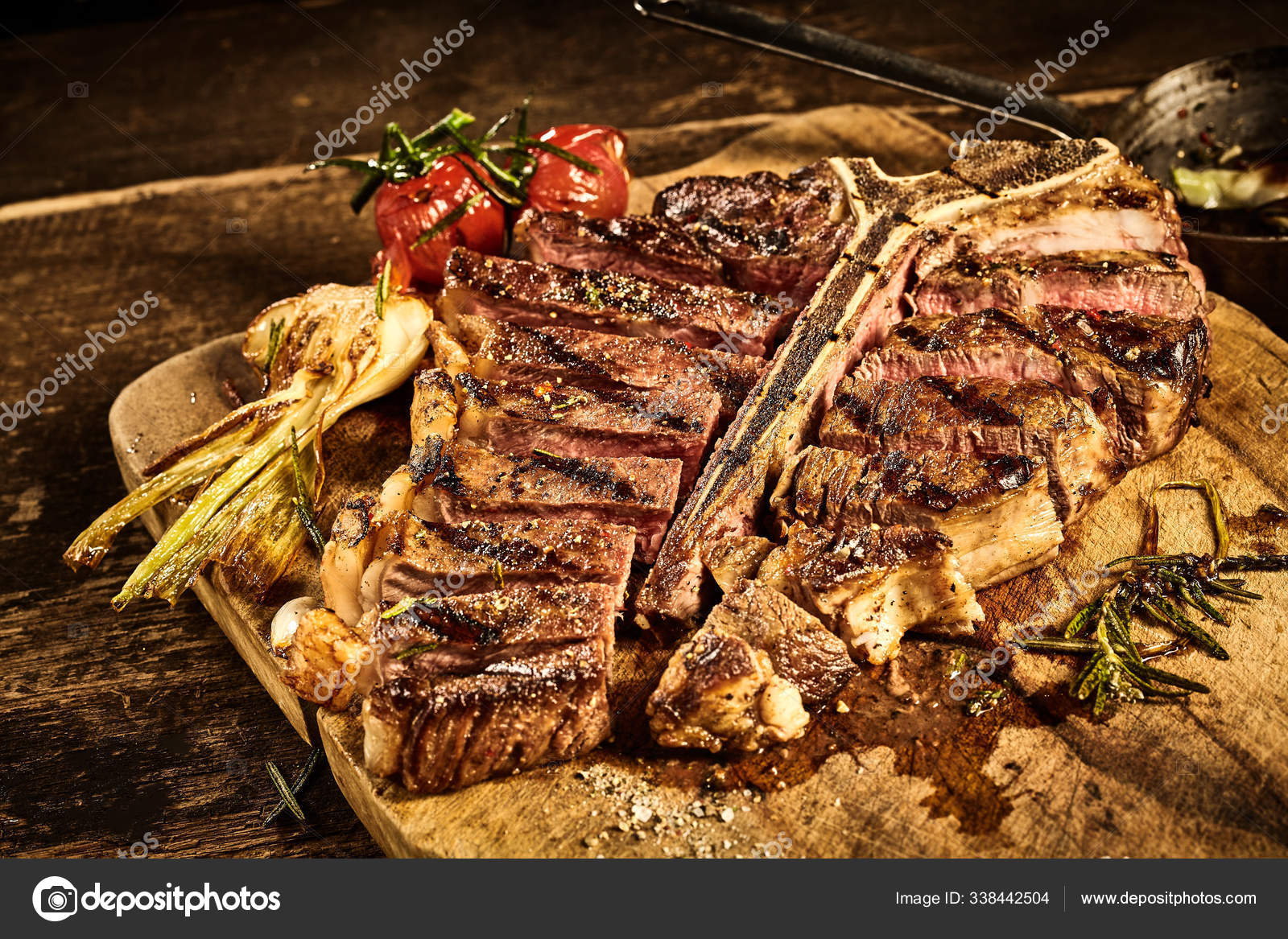 Medium Rare Cooked Large Porterhouse Steak Front Roasted Garlic Tomato ...