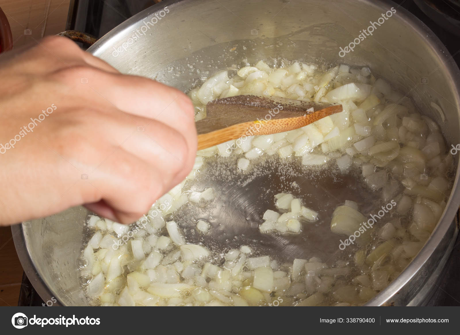 Frying Chopped Onion Pan — Stock Photo © PantherMediaSeller #338790400