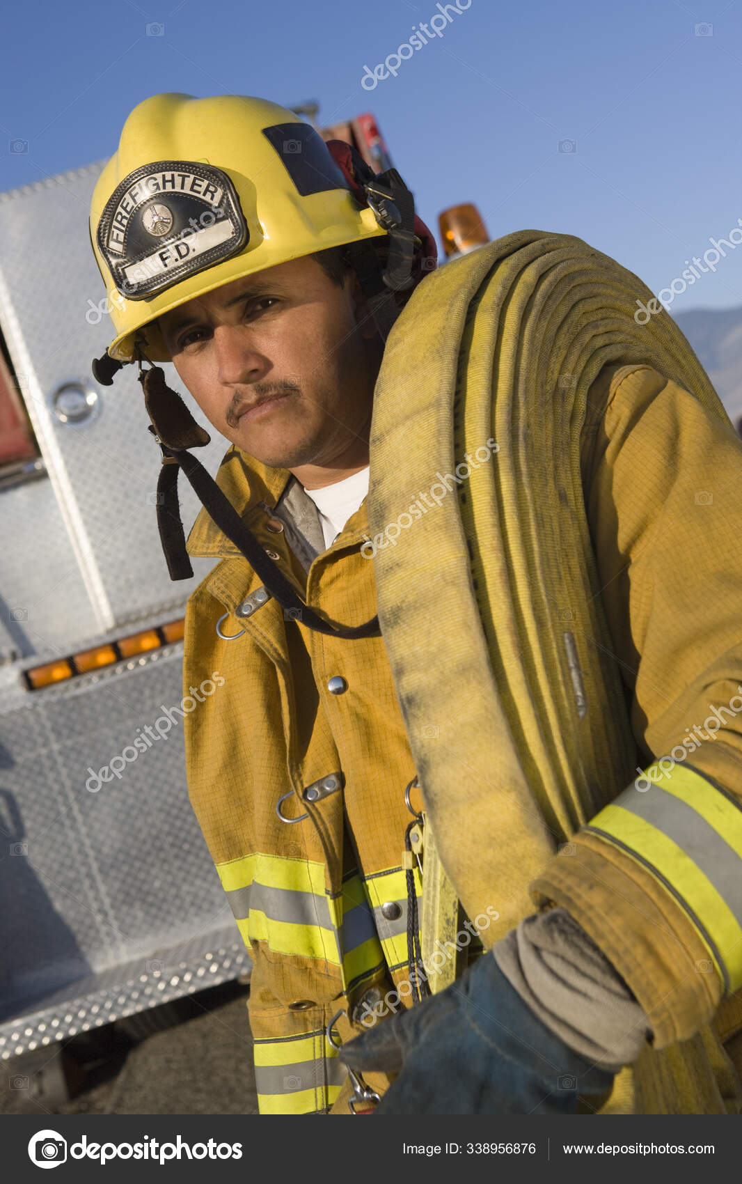 Portrait Fire Fighter Carrying Fire Hose Shoulder — Stock Photo ...