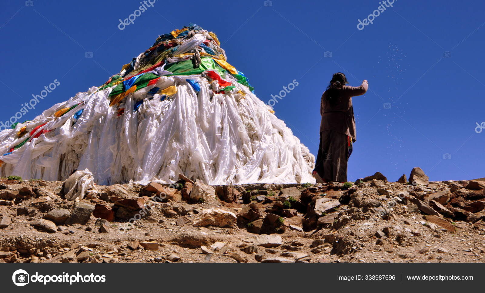Tibetan Throwing Ash Wind Stock Photo by ©PantherMediaSeller 338987696