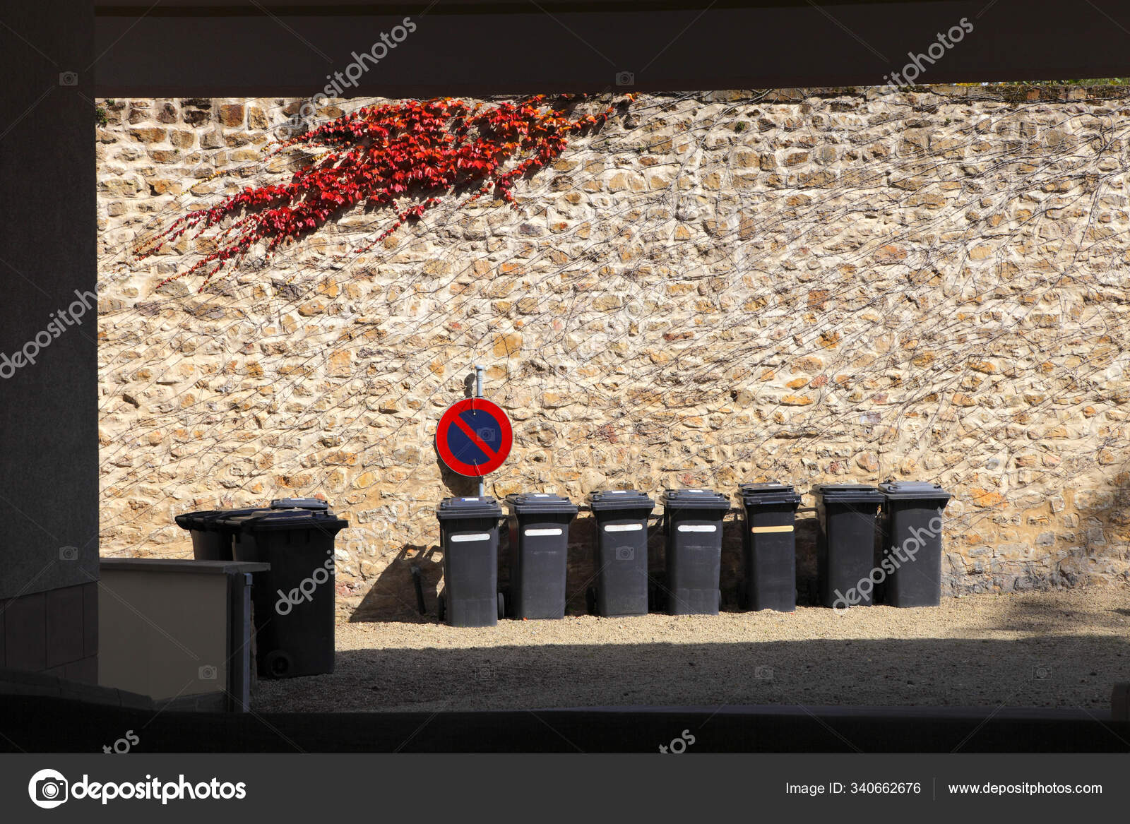 Seven Garbage Cans Alley — Stock Photo © PantherMediaSeller #340662676