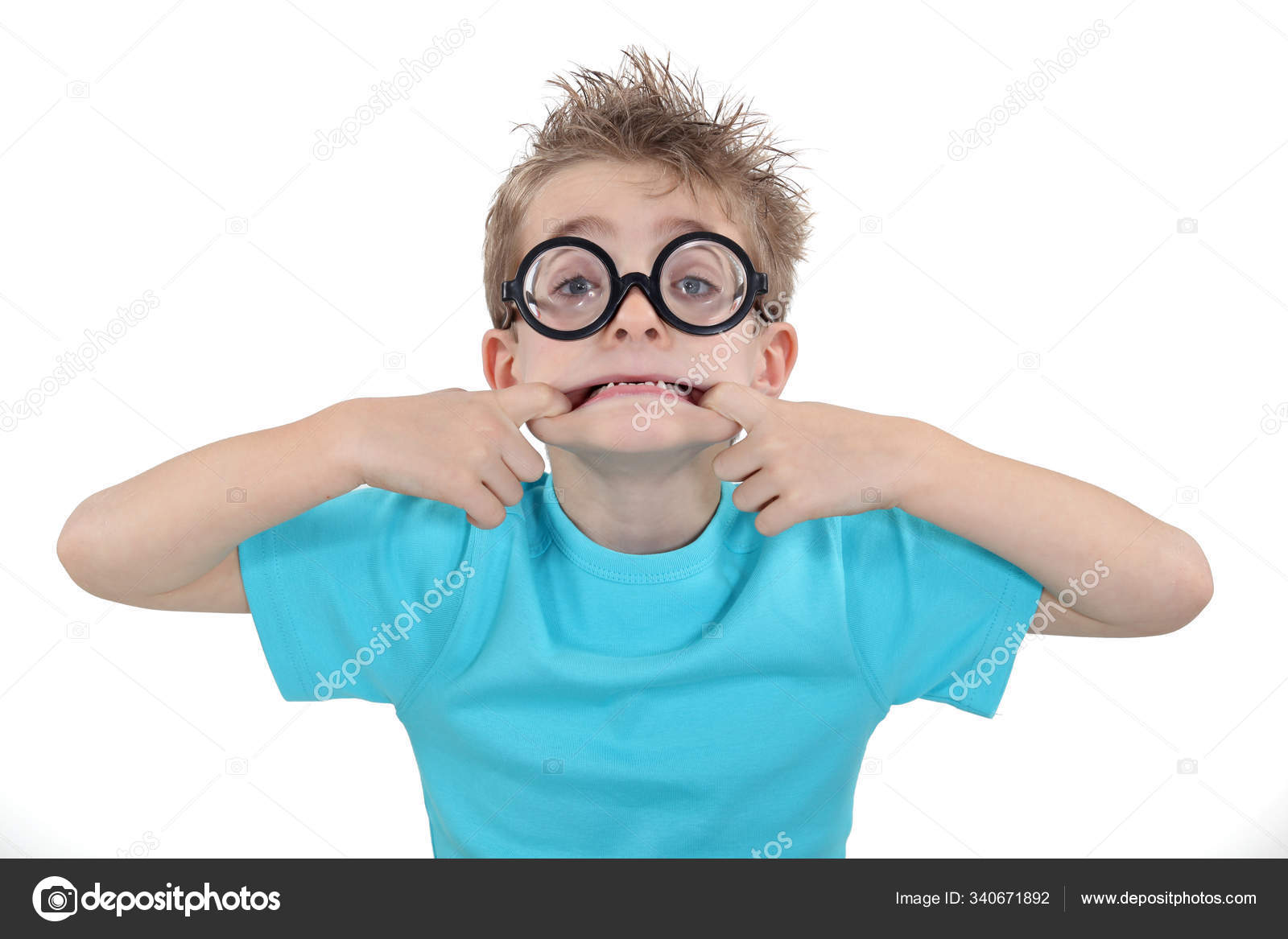 Kid Making Funny Face Stock Photo by ©PantherMediaSeller 340671892