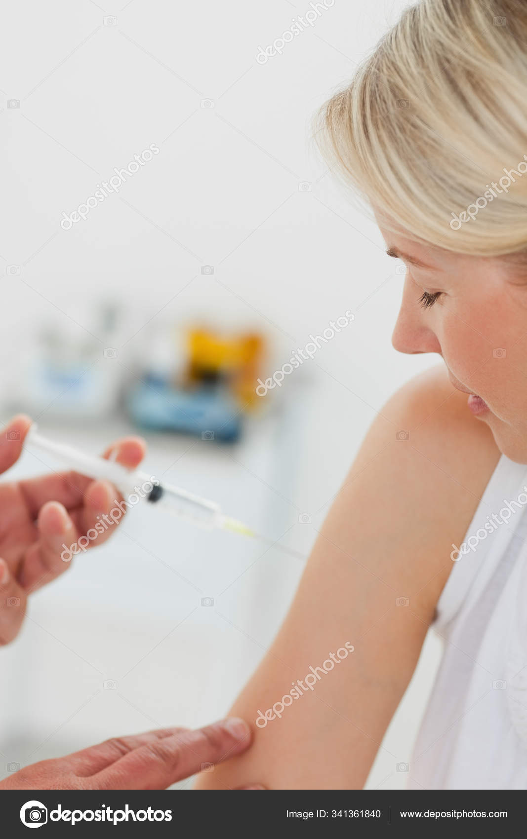 Close Woman Getting Injection Stock Photo by ©PantherMediaSeller 341361840