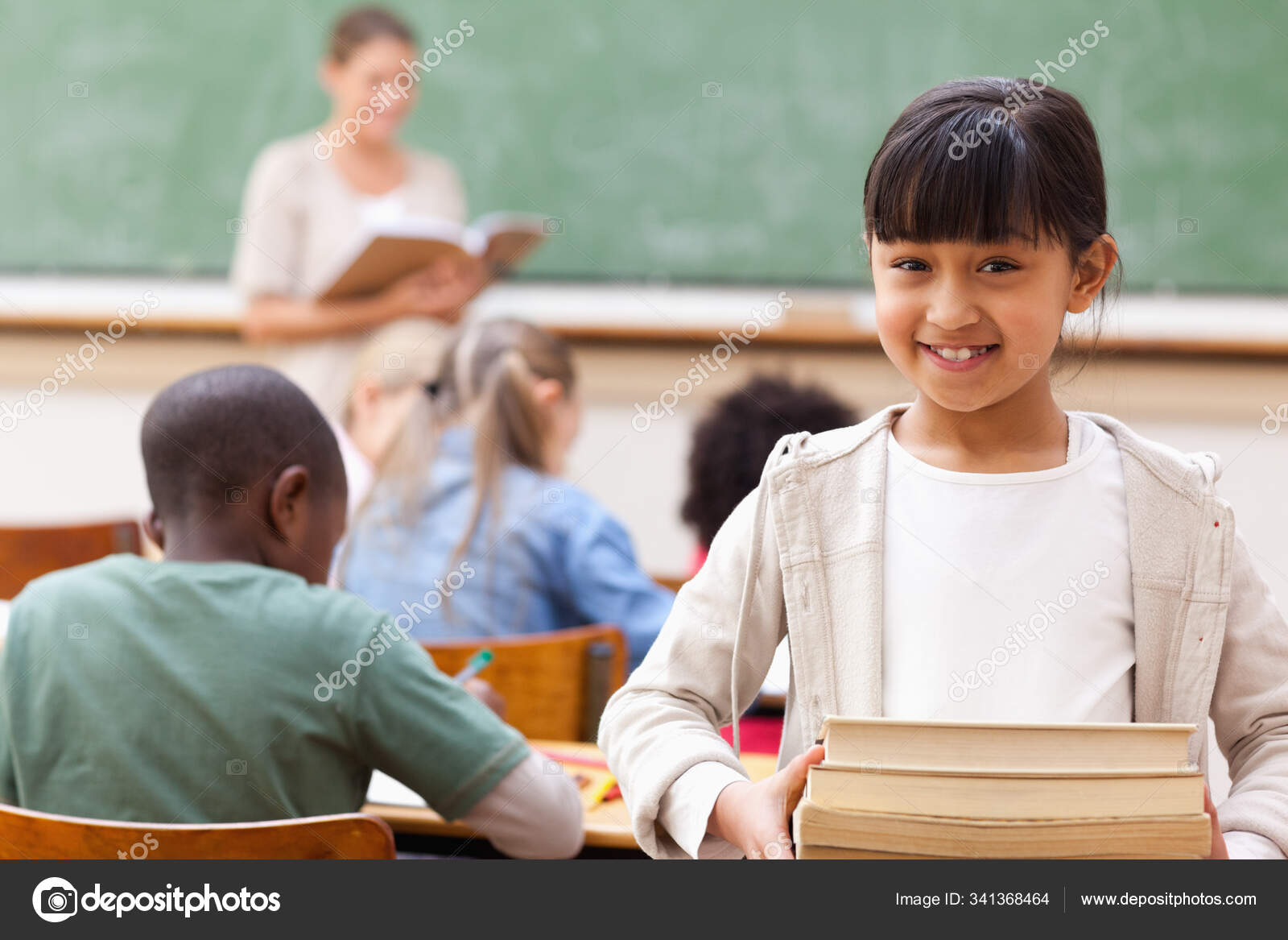 Smiling Student Books Standing Classroom Stock Photo by ...