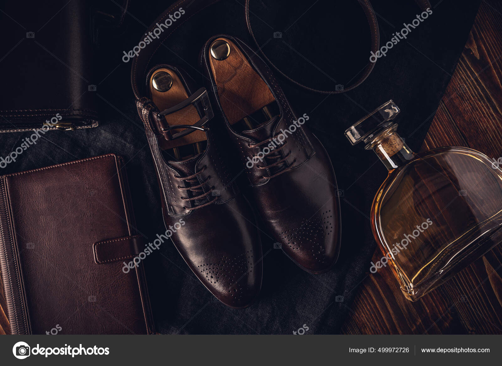Men's Shoes Wooden Background Stock Photo by ©PantherMediaSeller 499972726