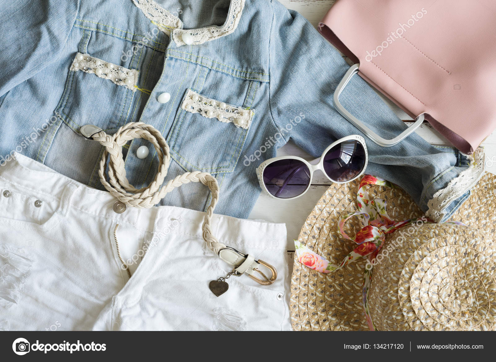 Overhead view of womens cloths shirt and accessories Stock Photo by ...
