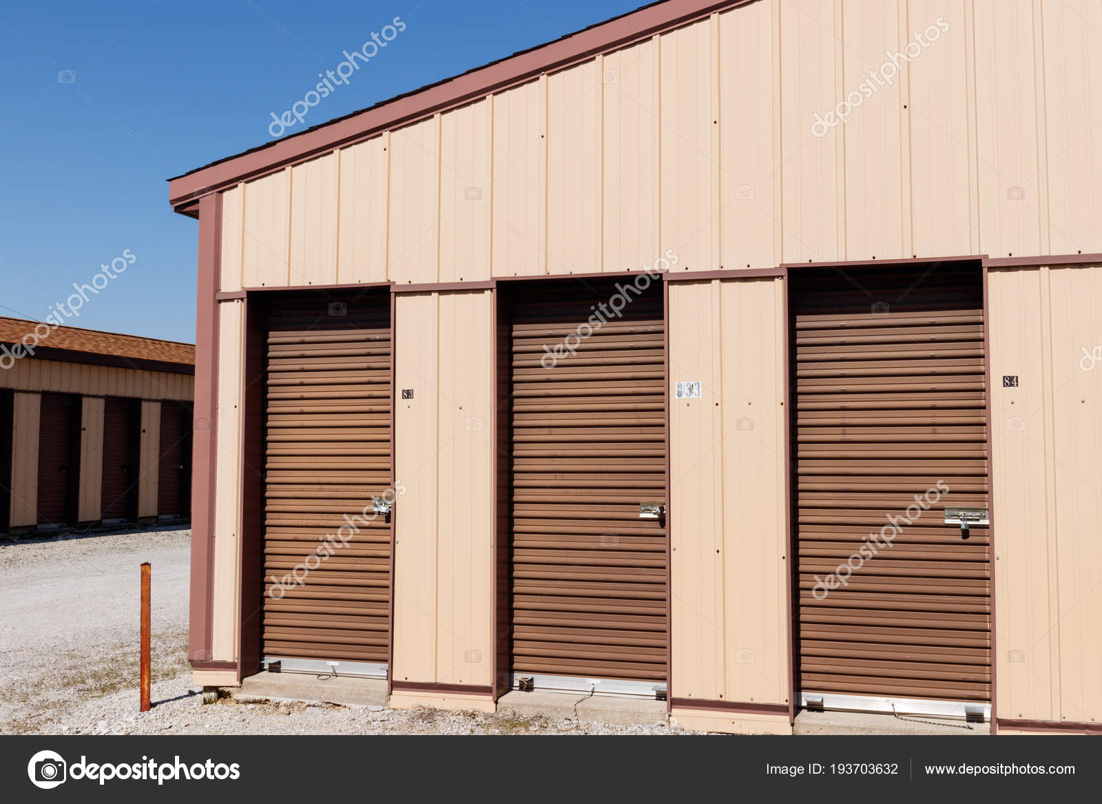 Brown numbered self storage and mini storage garage units II — Stock ...
