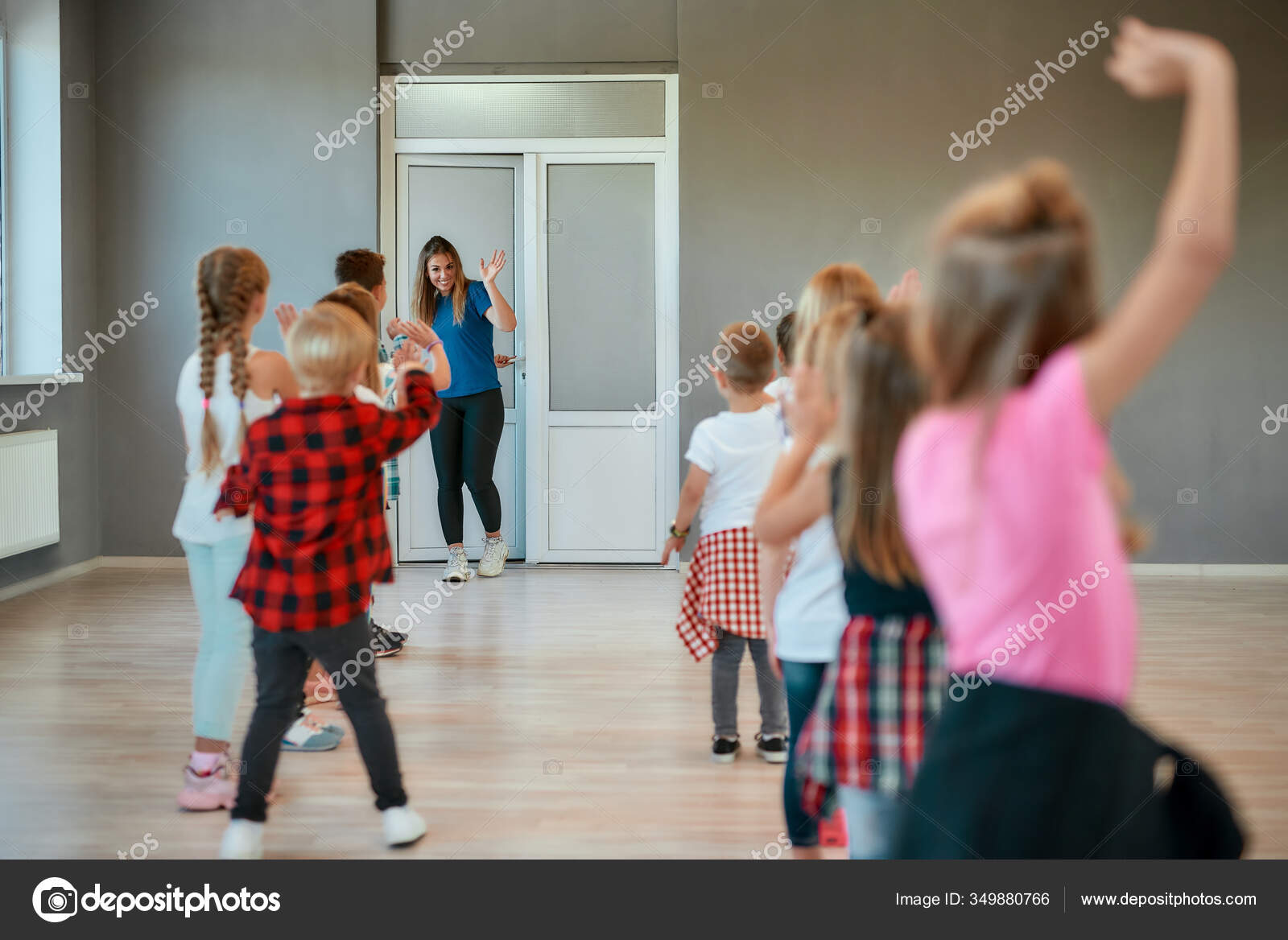 Kids Waving Hello To Each Other