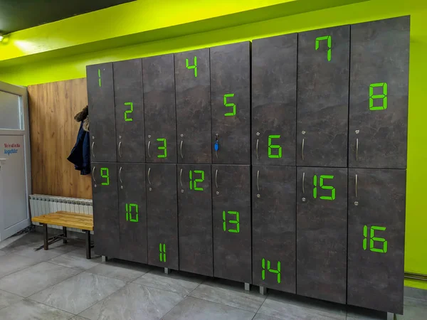 Modern style locker room or dressing room with numbers on lockers in ...
