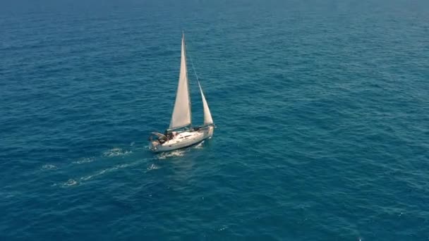 Yacht sailing on opened sea. Sailing boat. Yachting video. Yacht from above. Yachting at windy ...
