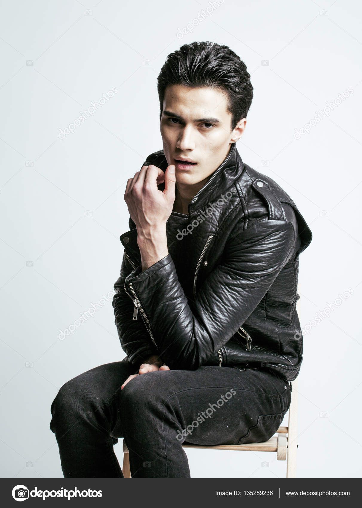 young handsome man in leather jacket — Stock Photo © iordani #135289236