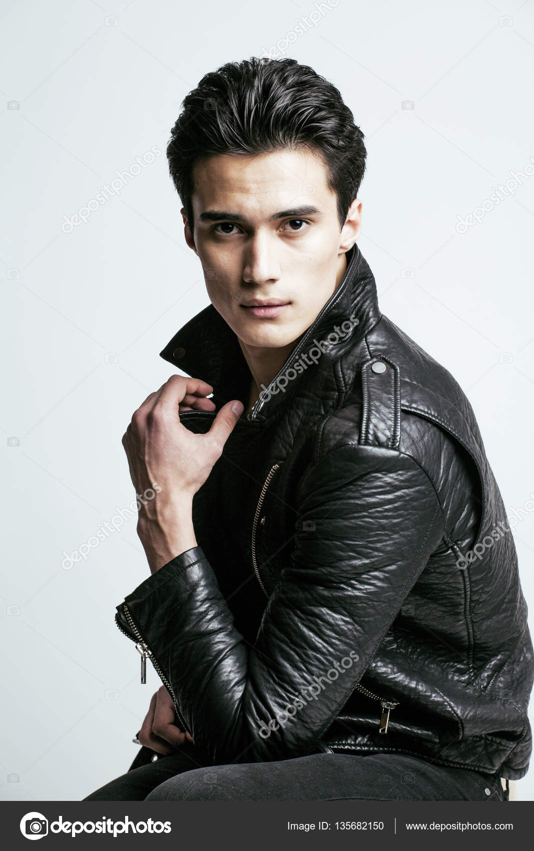 Young handsome man in leather jacket Stock Photo by ©iordani 135682150