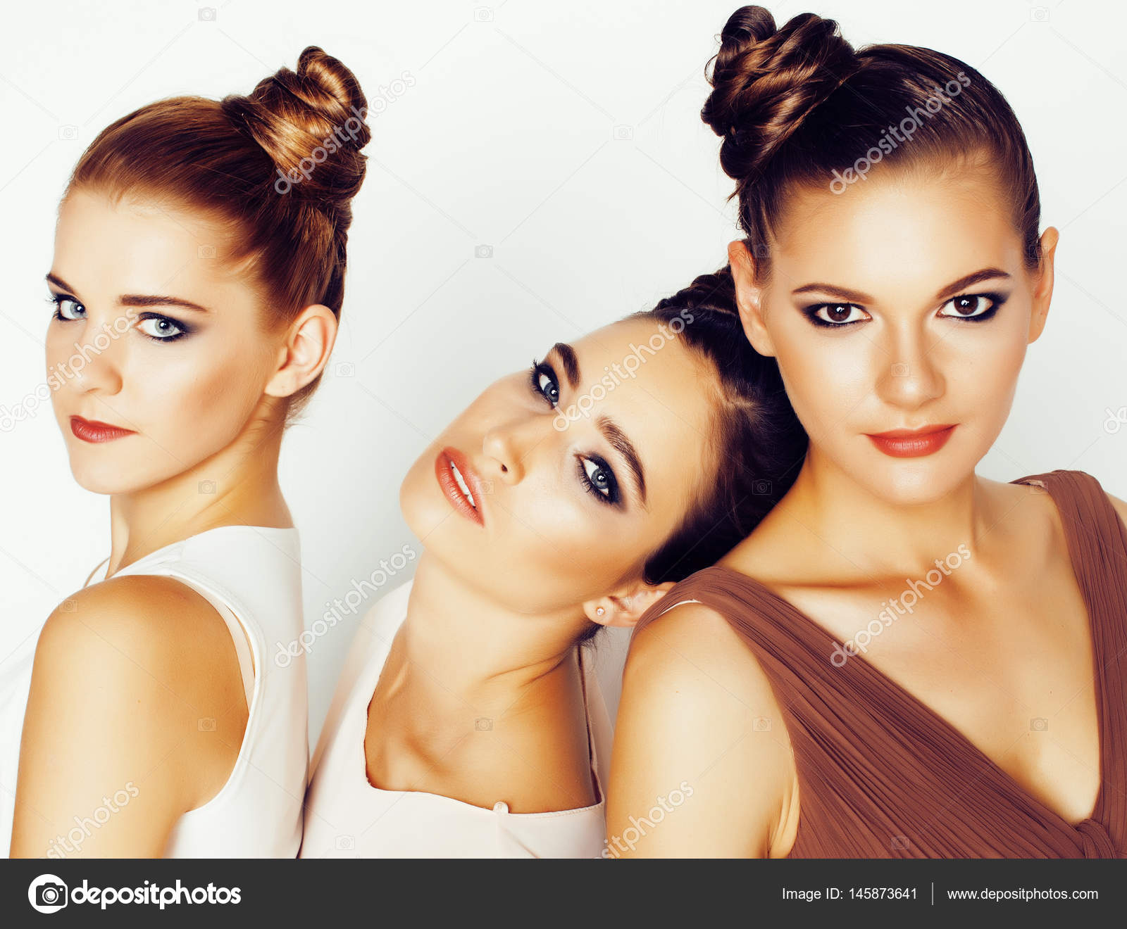 Women with same hairstyle Stock Photo by ©iordani 145873641
