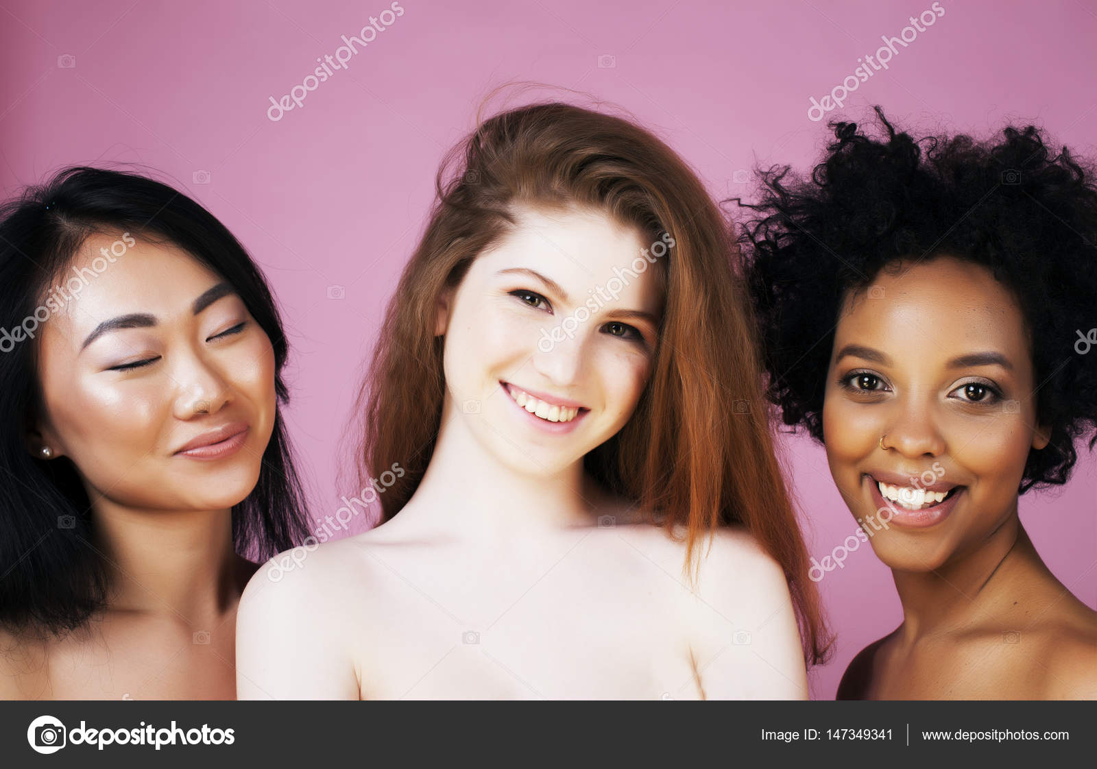 Three different nation girls Stock Photo by ©iordani 147349341