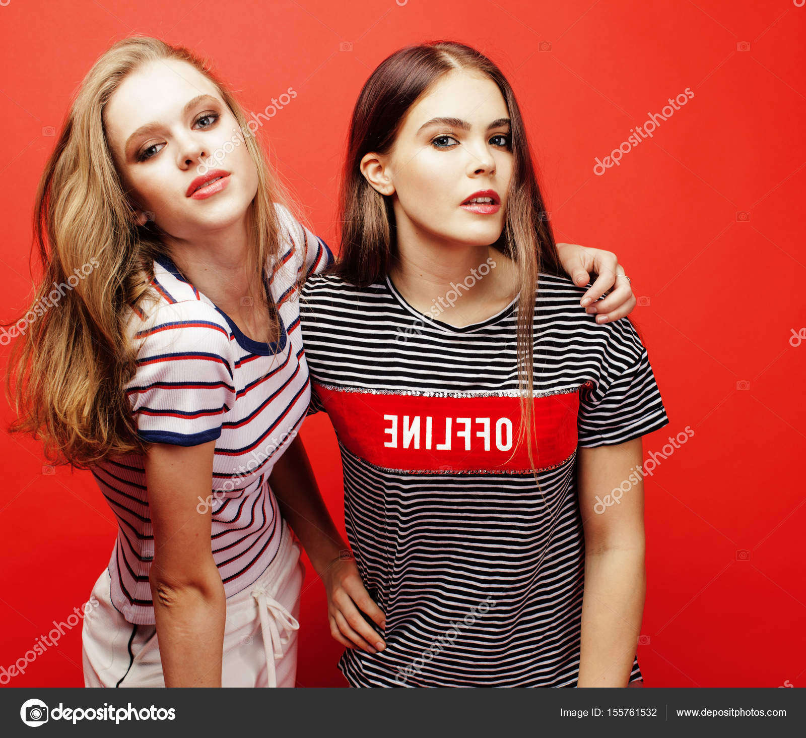 Two best friends teenage girls together having fun, posing emotional on ...