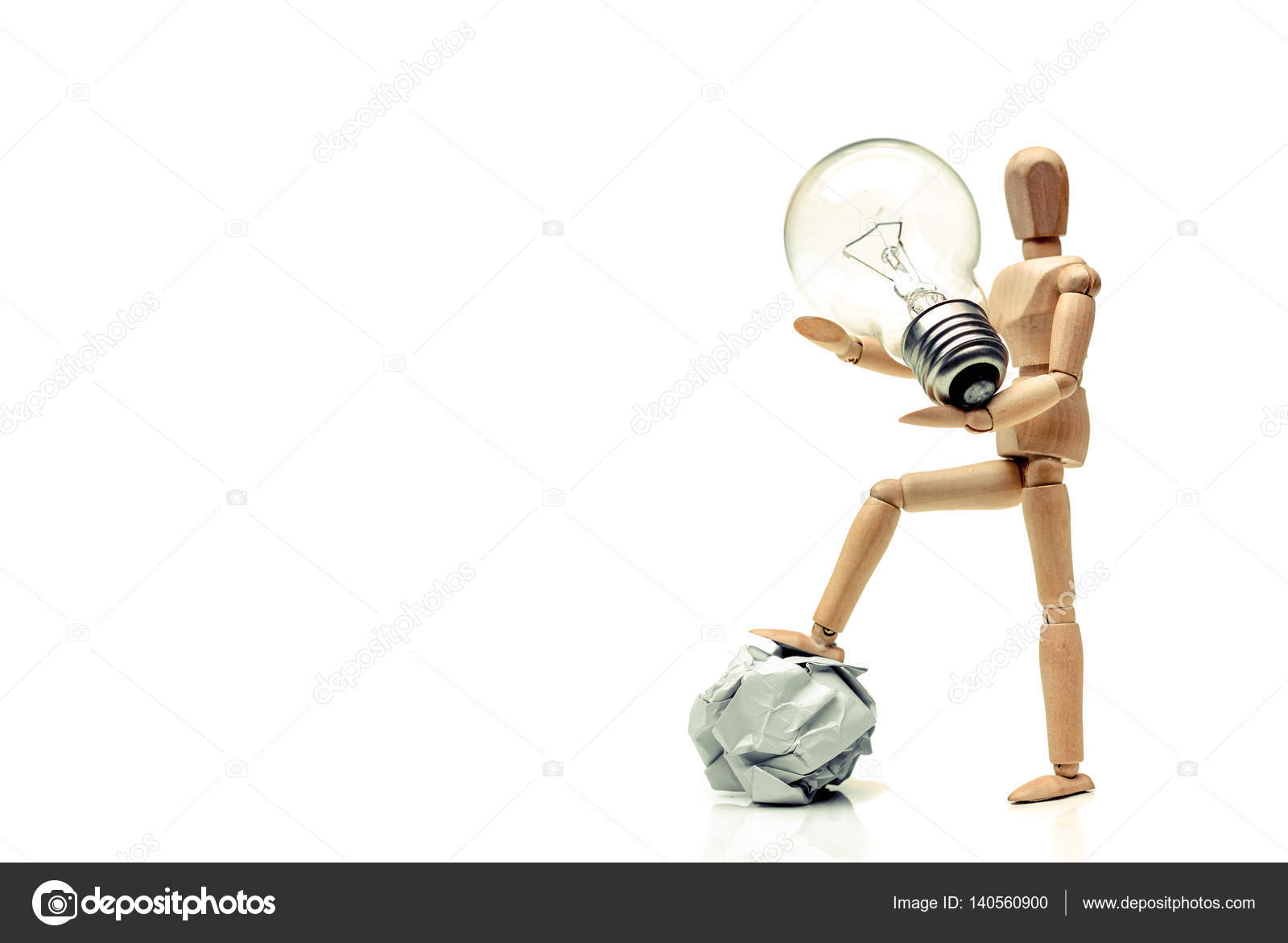 Mannequins carrying light bulb Stock Photo by ©weerapat 140560900