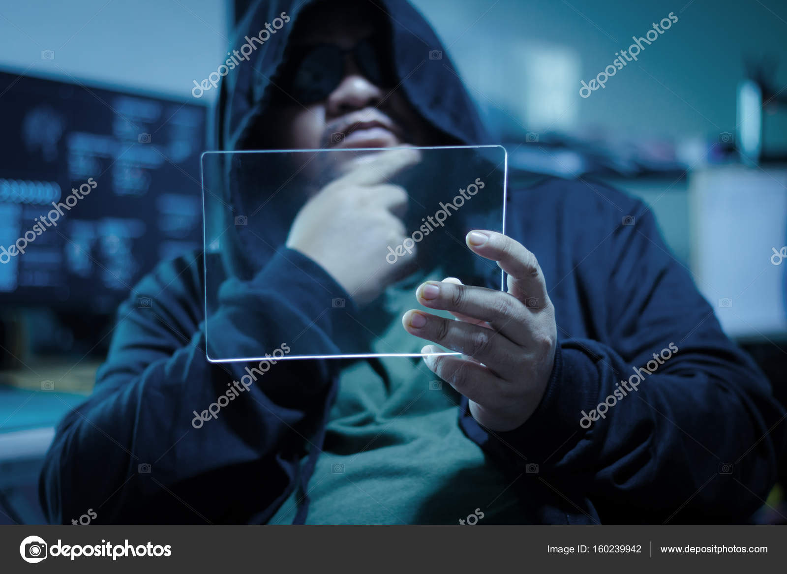 Hacker using blank clear glass tablet with dark and grain proces Stock ...