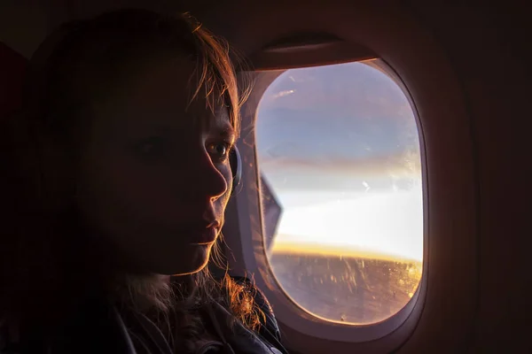 Girl in airplane window Stock Photos, Royalty Free Girl in airplane ...