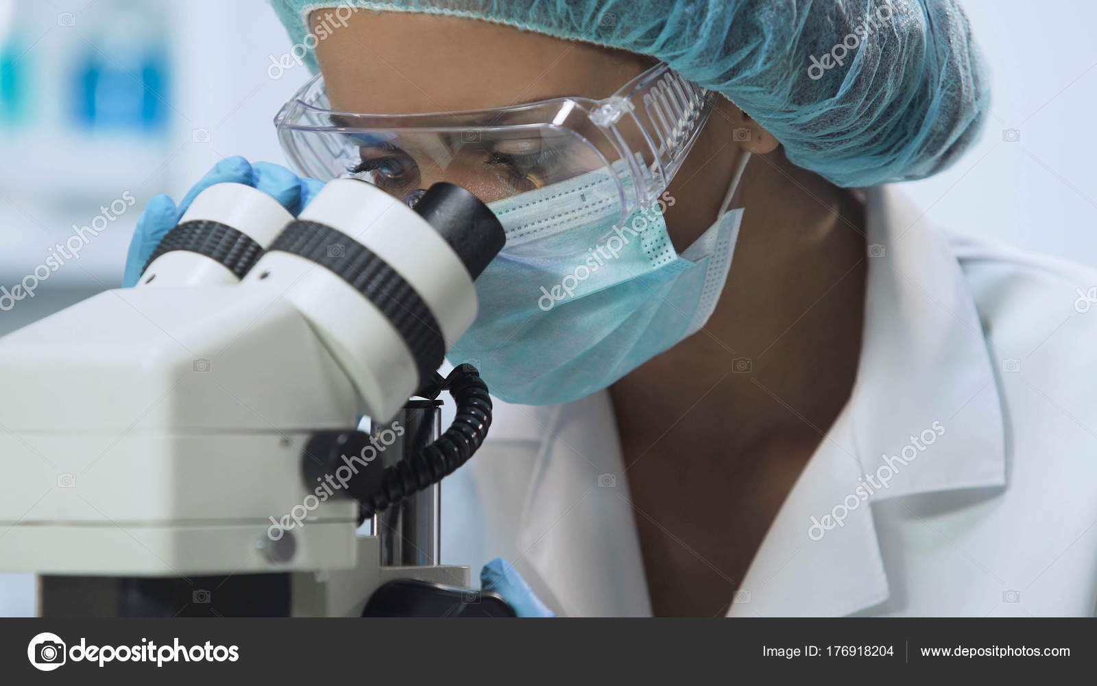 Young female scientist using microscope for microbiological analysis ... Young female scientist using microscope for microbiological analysis ...