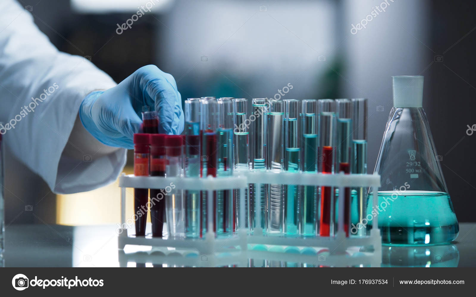 Laboratory working surface occupied by test tubes and flasks, research ...