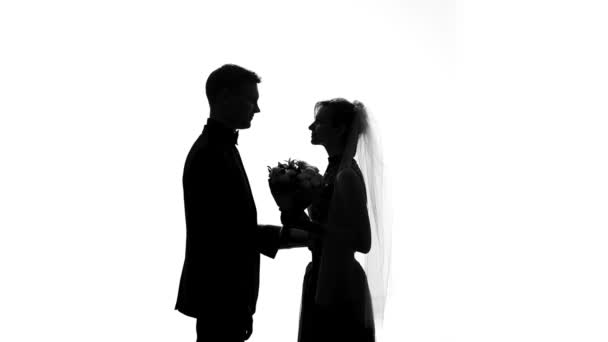 Groom and bride shadow kissing during wedding ceremony, romantic day ...