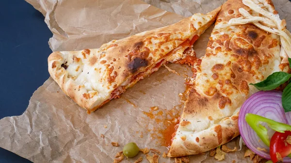 close-up view of gourmet calzone on restaurant table - Stock Image ...