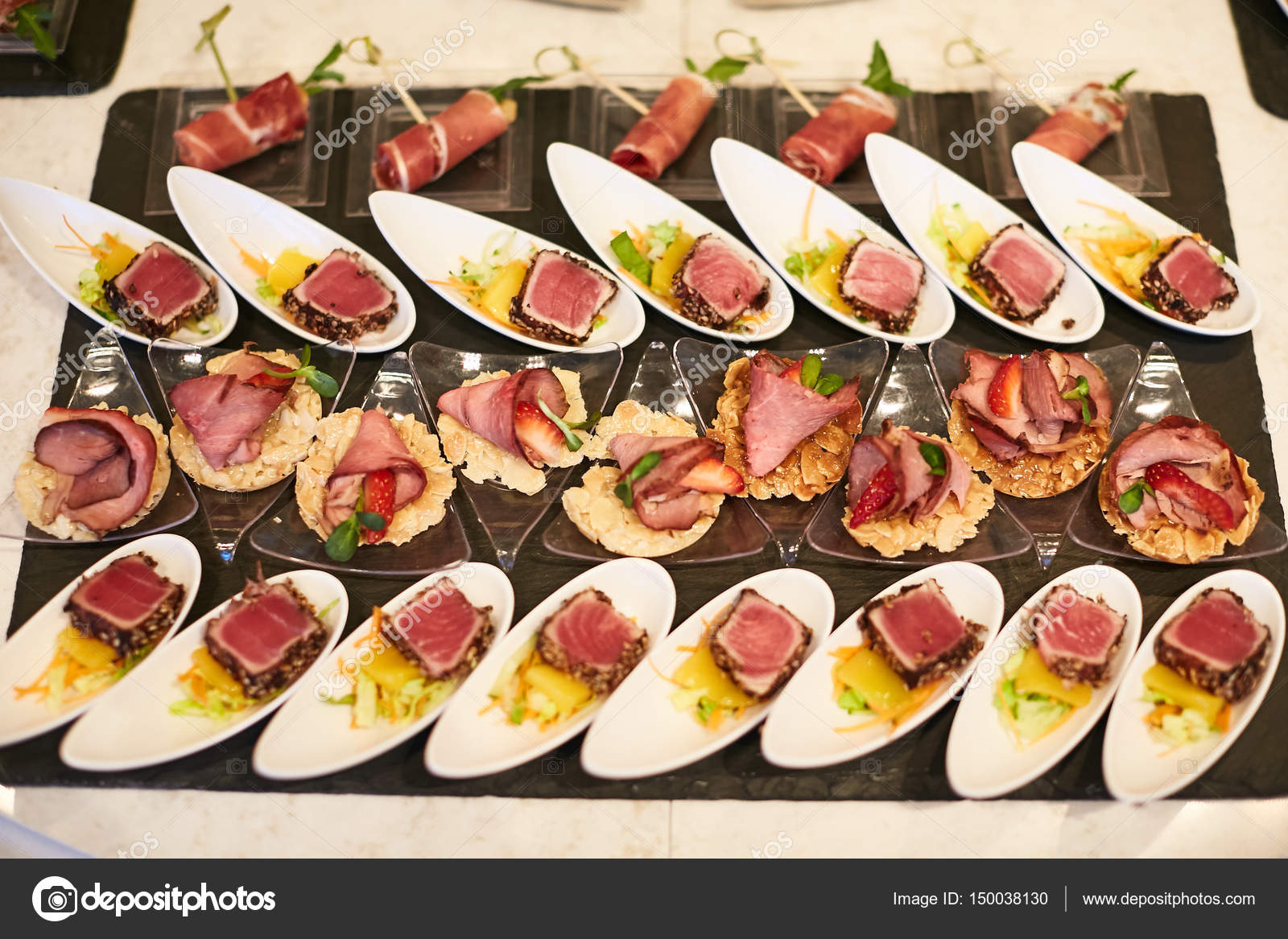 Serving buffet table Stock Photo by ©serdiukov 150038130