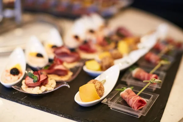 Serving buffet table Stock Photo by ©serdiukov 150038130