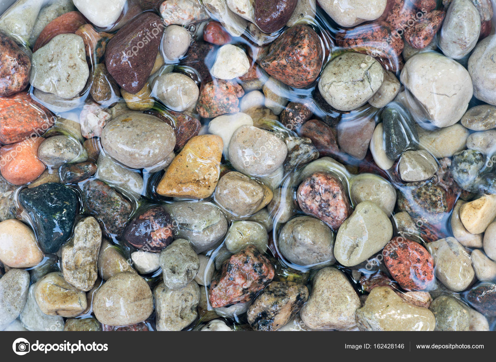 Pebble stones in water Stock Photo by ©aga77ta 162428146