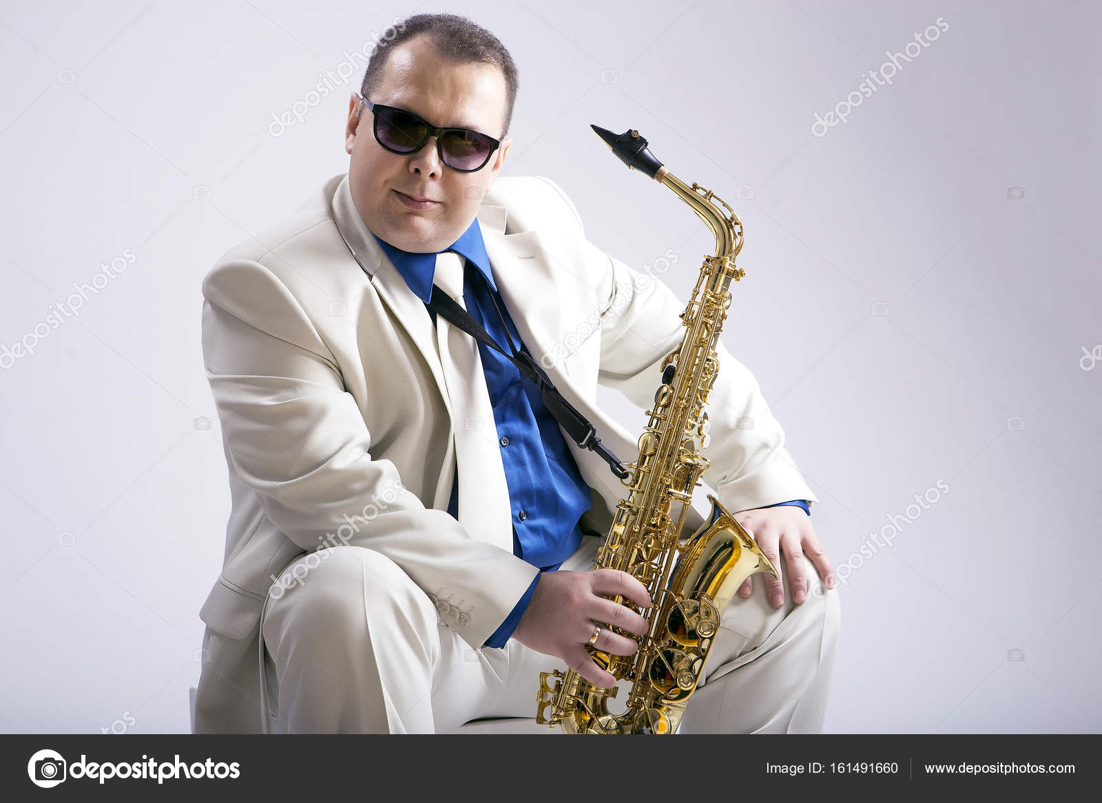 Playing the saxophone — Stock Photo © sgpozhoga #161491660