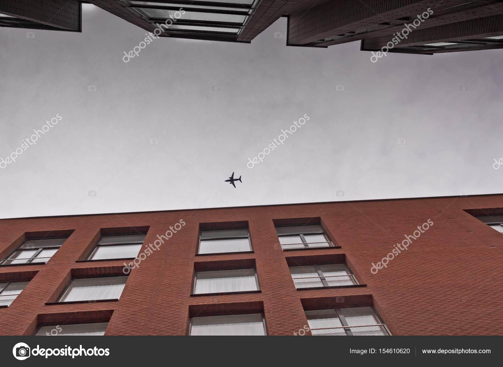 Airplane Between Buildings — Stock Photo © k009034 #154610620