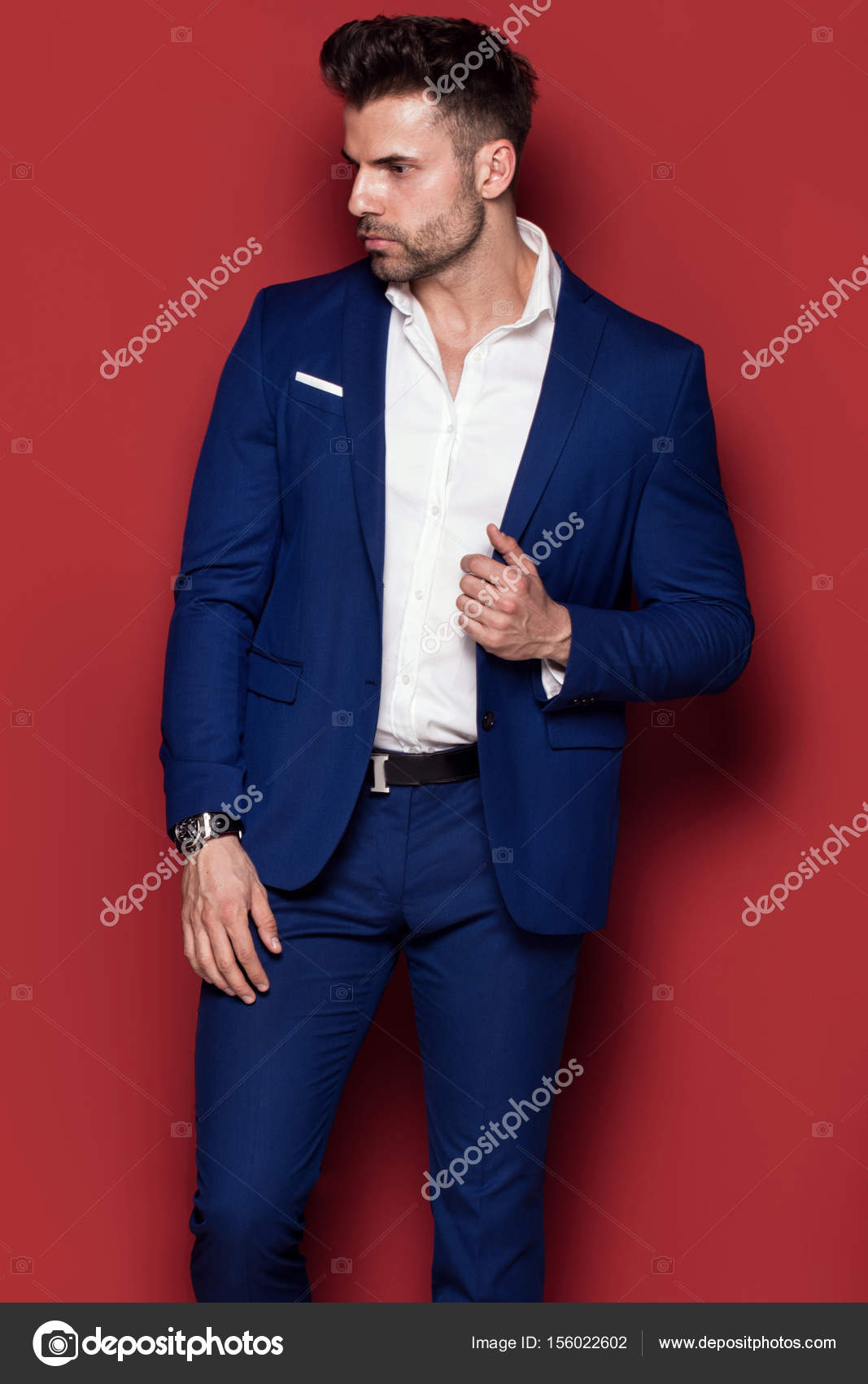 Handsome man posing in suit. Stock Photo by ©NeonShot 156022602