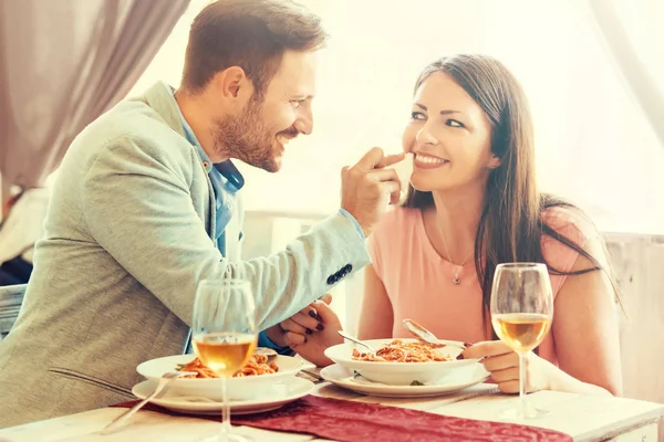 Happy Couple Eating Spaghetti Stock Photo by ©grki 136941416
