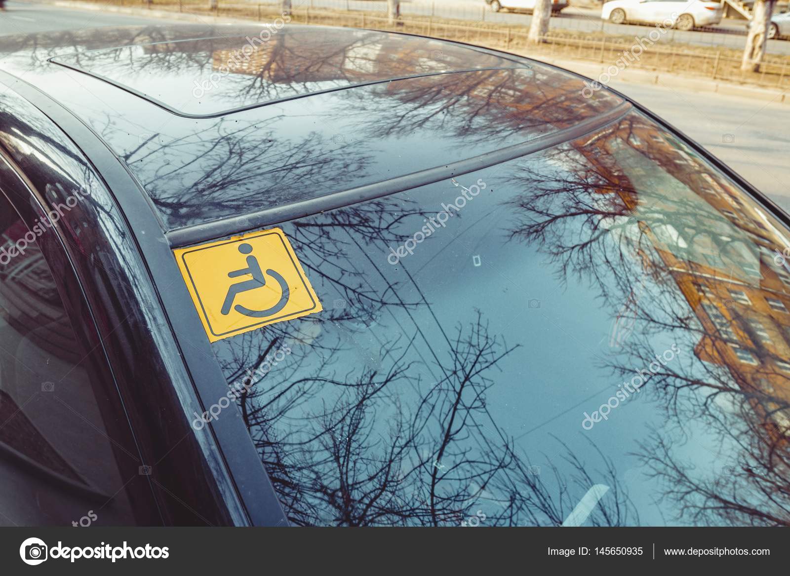 Disabled sign on the car glass. Stock Photo by ©kolidzeitattoo 145650935