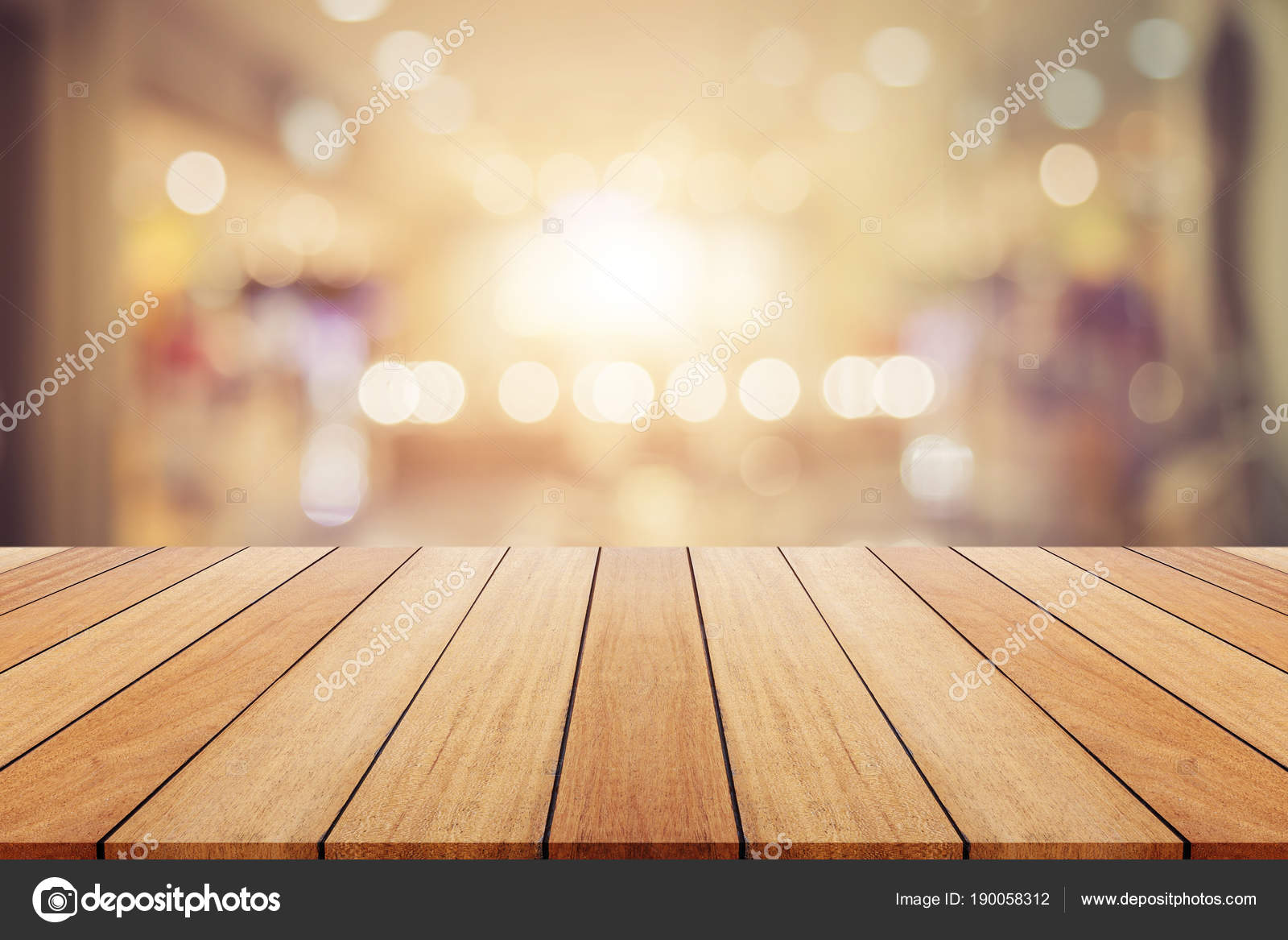 Wooden board or table and abstract blurred background. Free spac ...